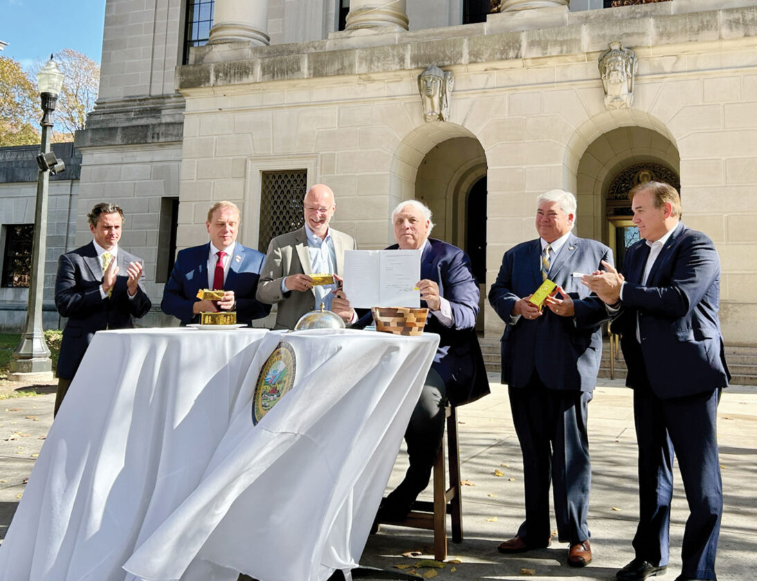 Justice holds ceremonial bill signing for 2% personal income tax cut ...